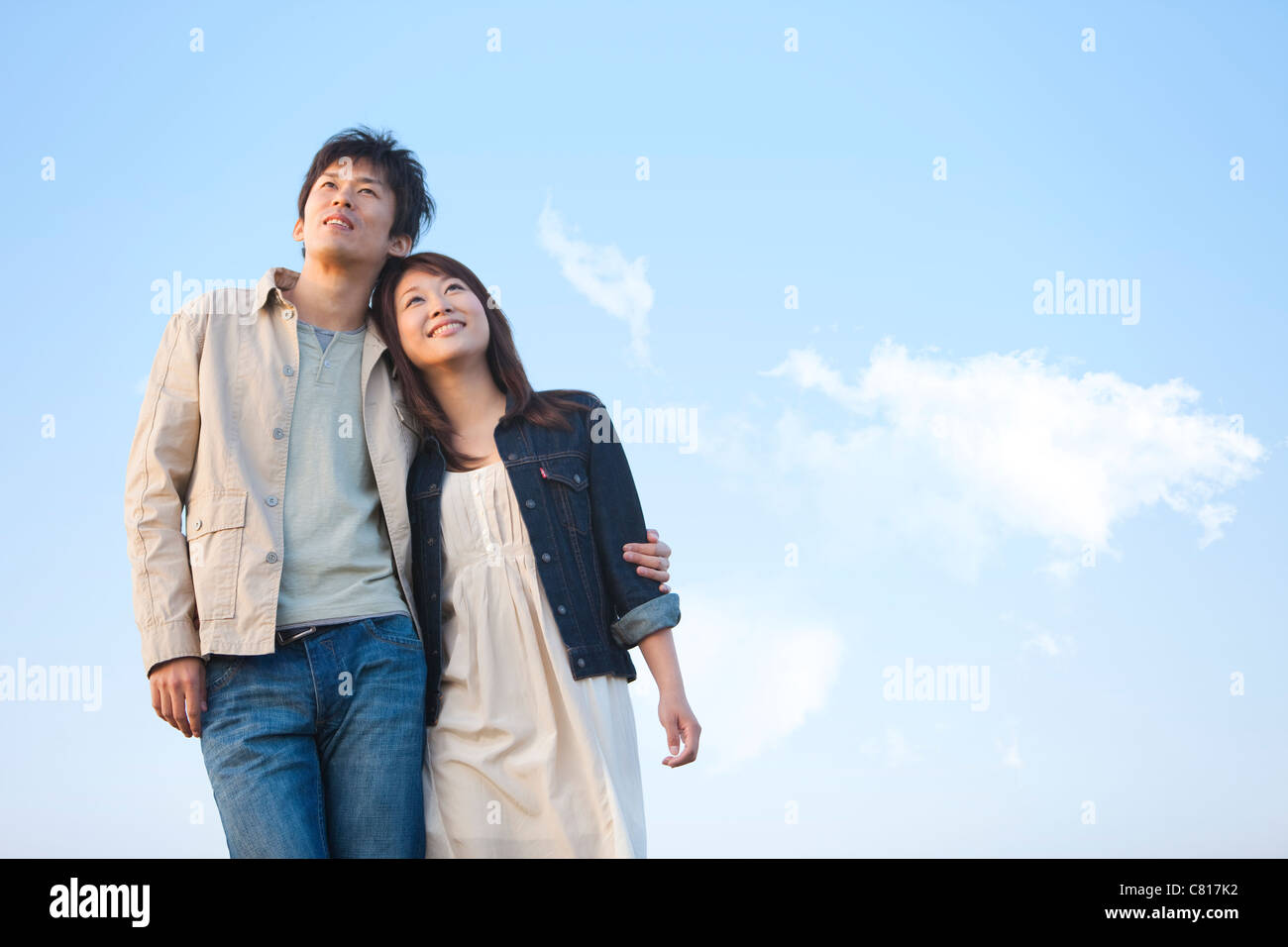 Mid adult couple looking up japanese hi-res stock photography and ...