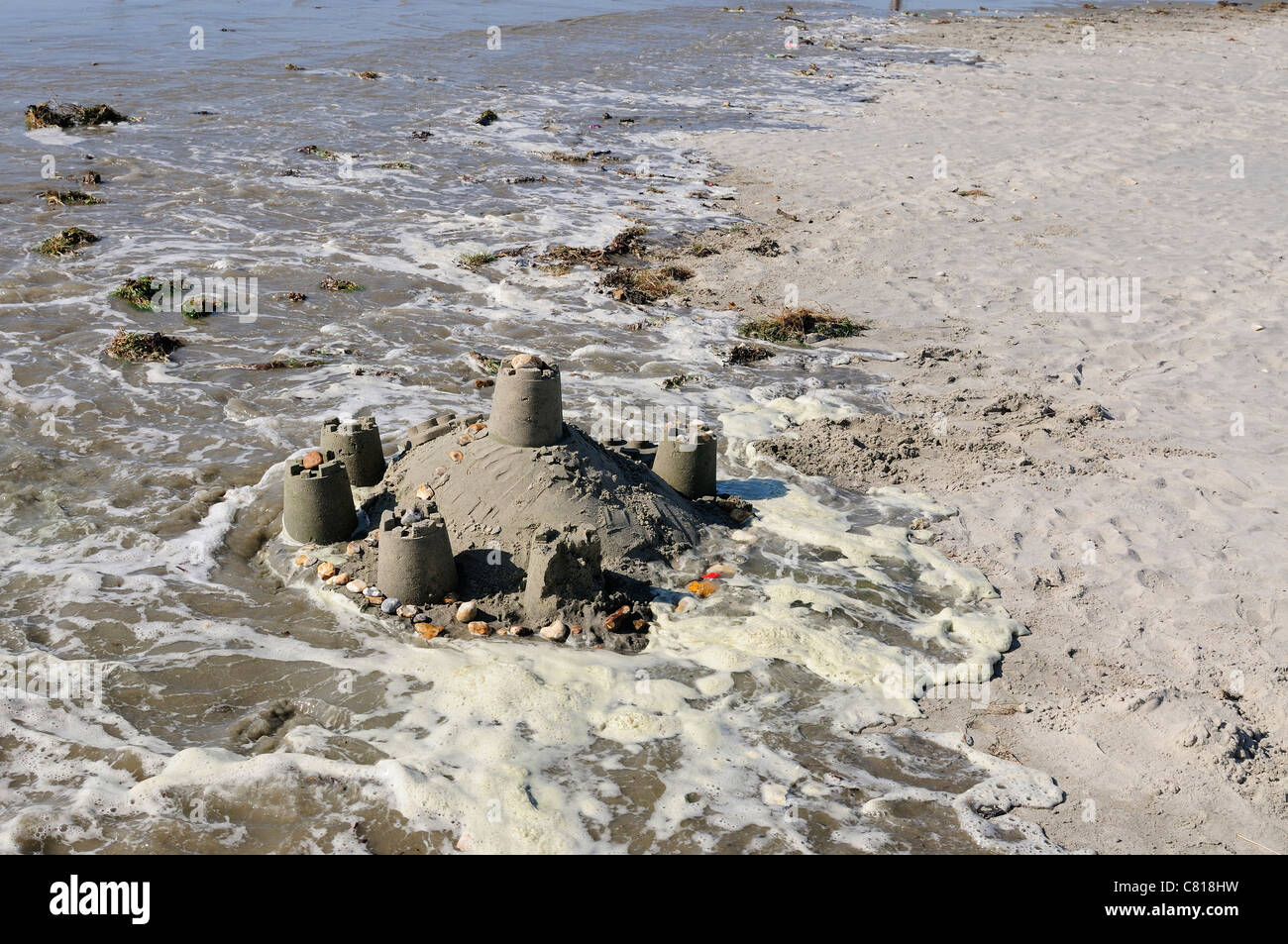 Sand castle being eroded hi-res stock photography and images - Alamy
