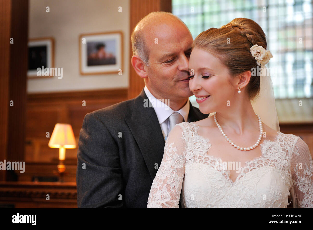 Wedding couple in church Stock Photo - Alamy