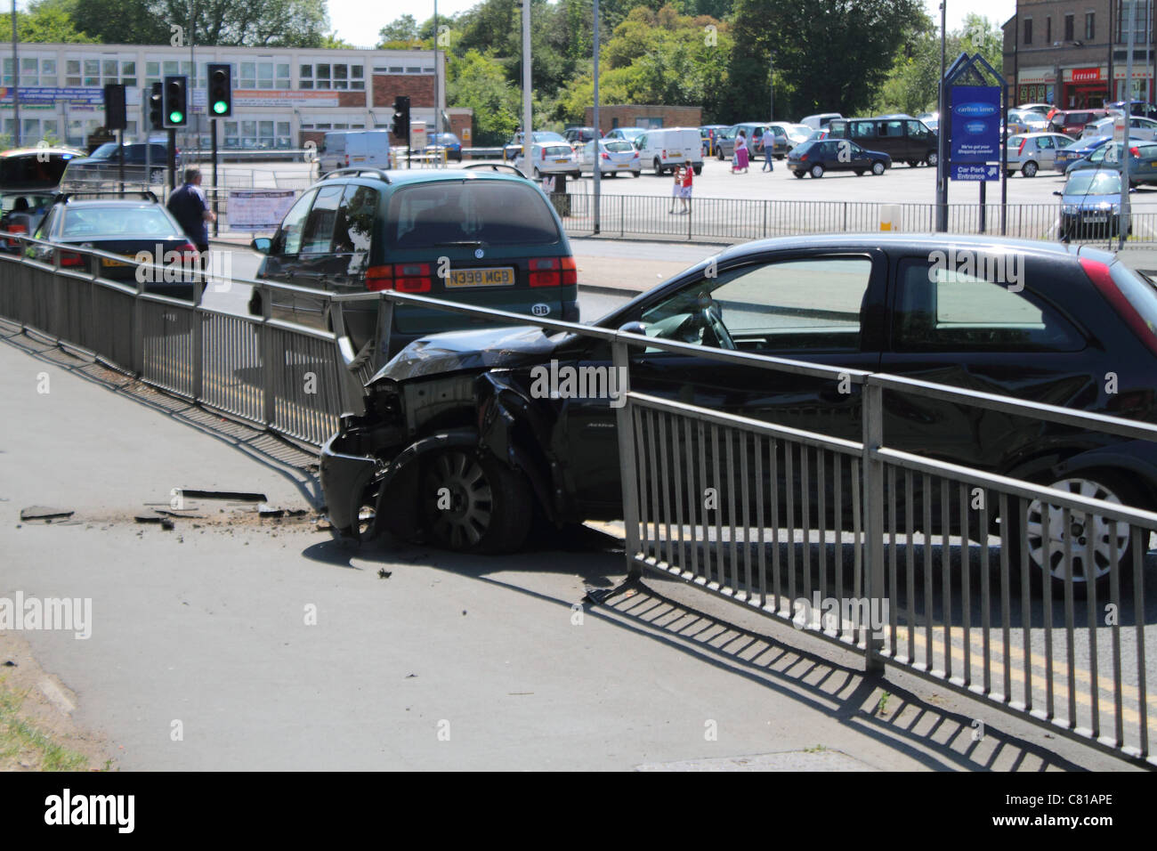 car crashed into railings Stock Photo - Alamy