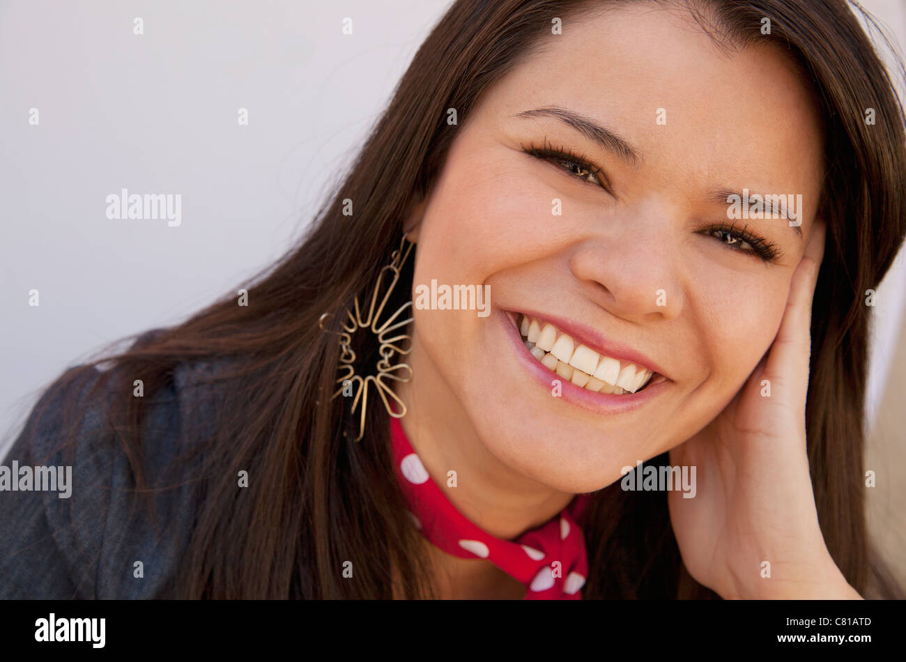 Smiling Hispanic woman Stock Photo - Alamy