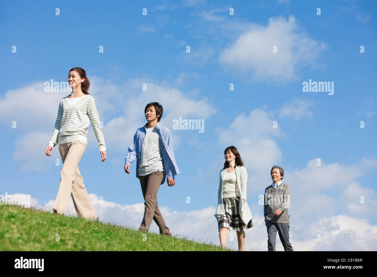 Family of Four with Adult Offspring Stock Photo - Alamy