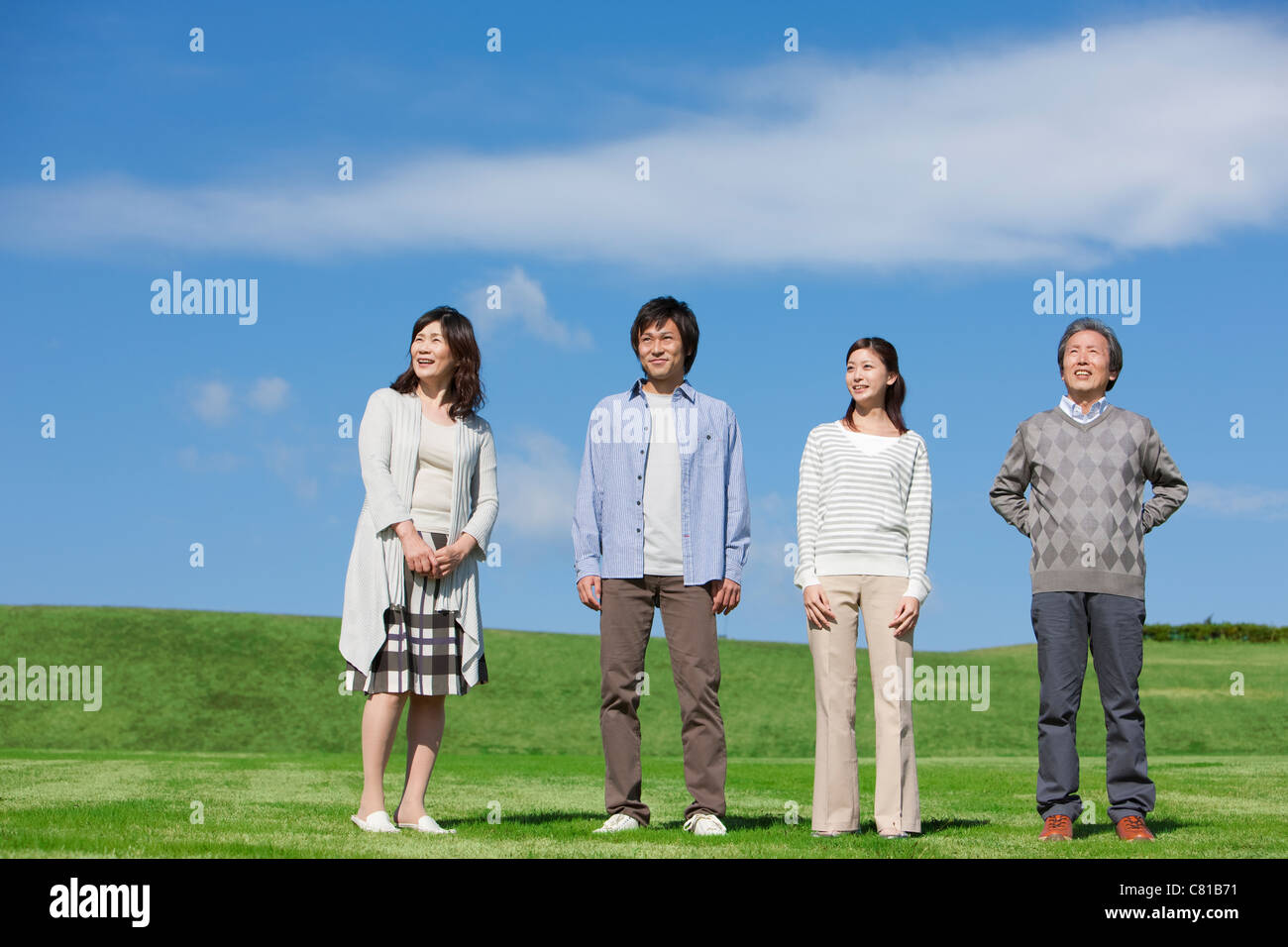 Family of Four with Adult Offspring Stock Photo - Alamy