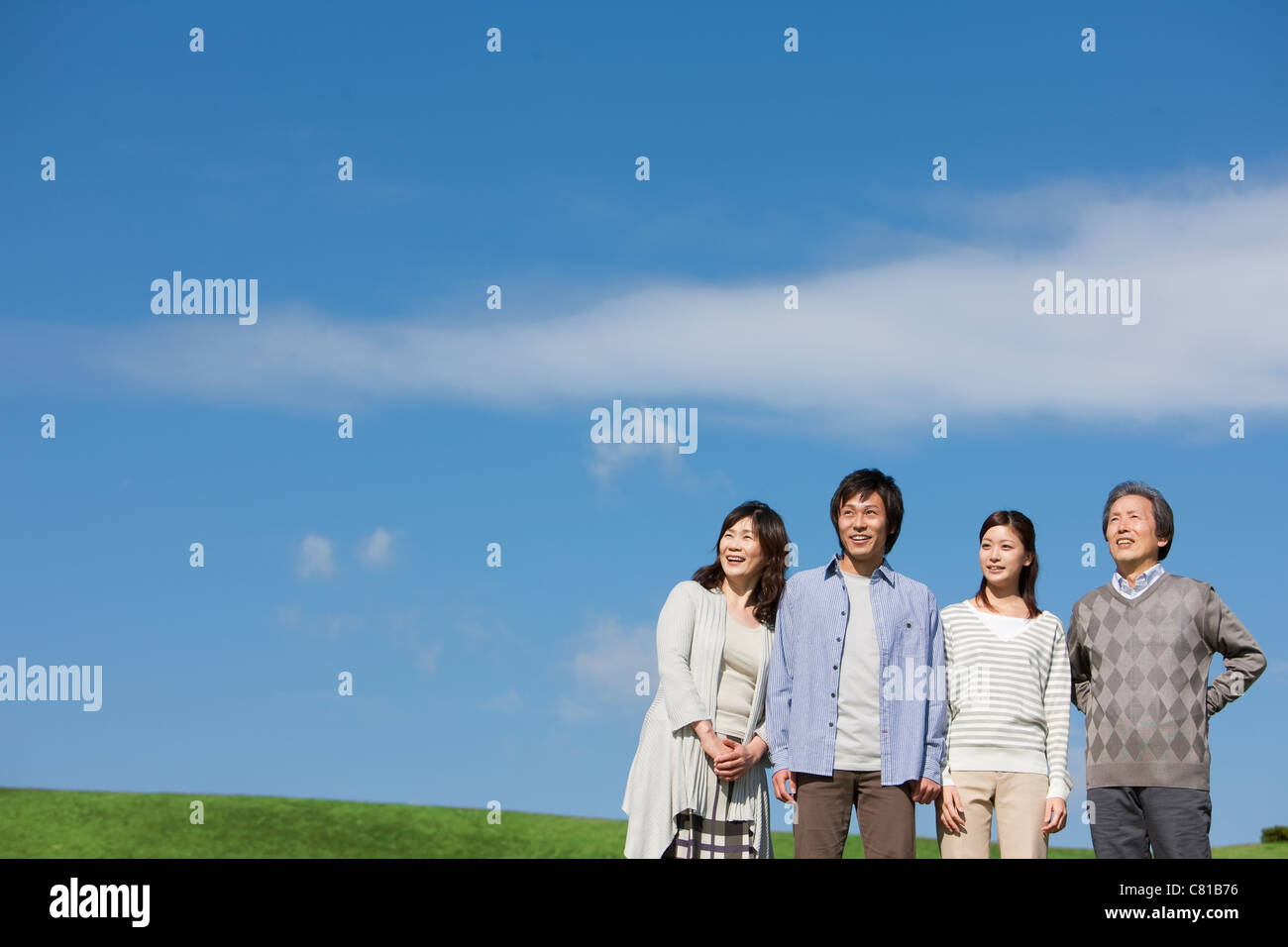 Family of Four with Adult Offspring Stock Photo - Alamy