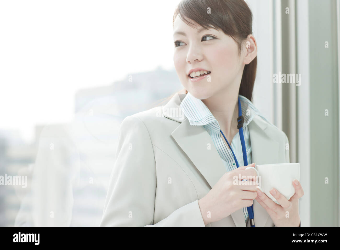 Businesswoman Having Tea Cup Stock Photo - Alamy