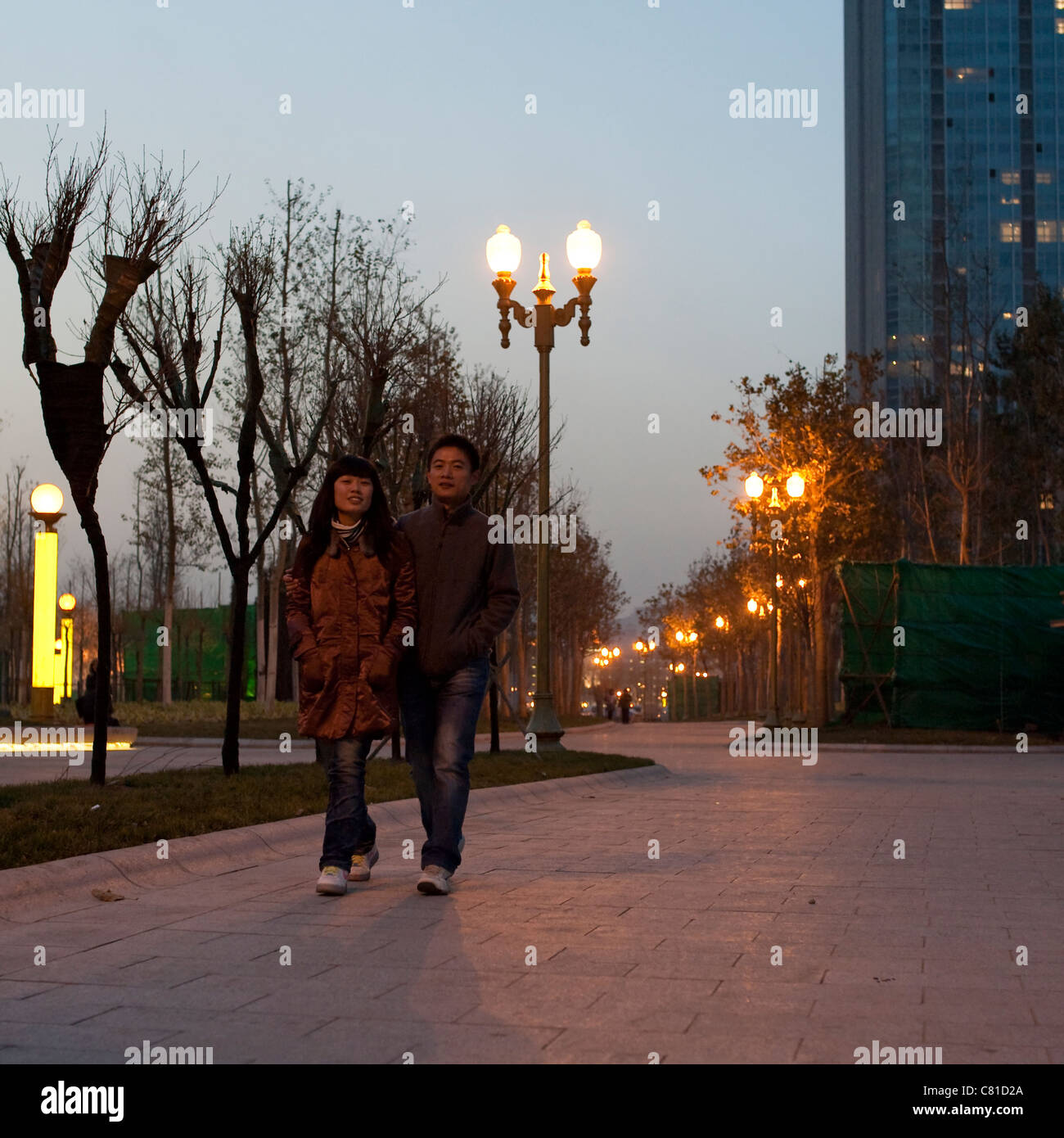 Couple dusk walking promenade hi-res stock photography and images - Alamy