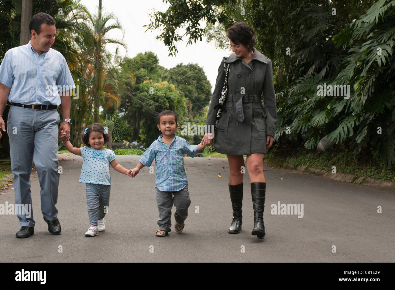 Latina mother with four children and her parents hi-res stock ...