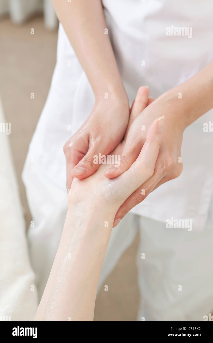 Woman Receiving Hand Massage Stock Photo - Alamy