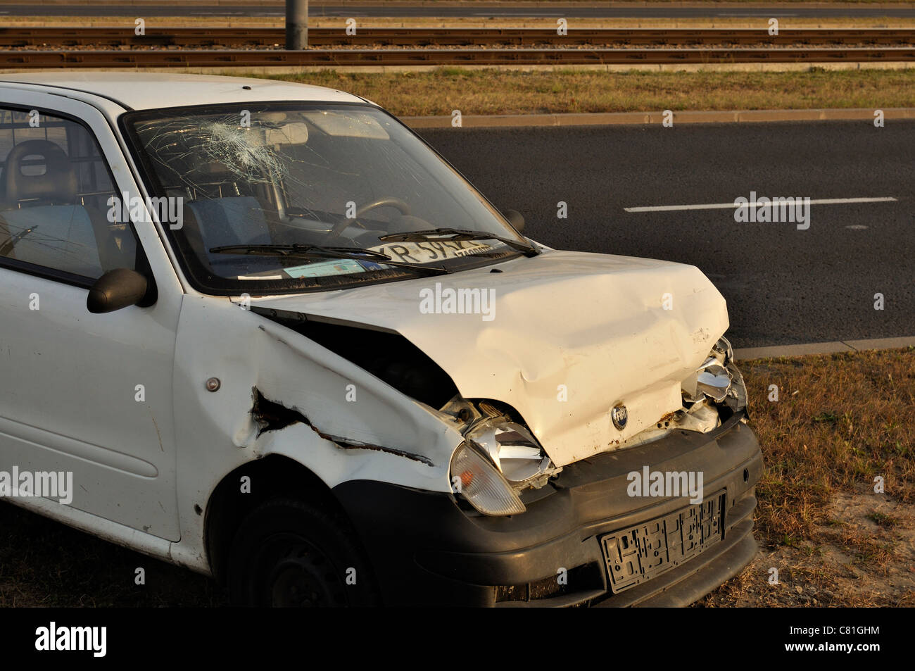 Crashed car near street - Fiat Seicento (600) damaged in an traffic ...