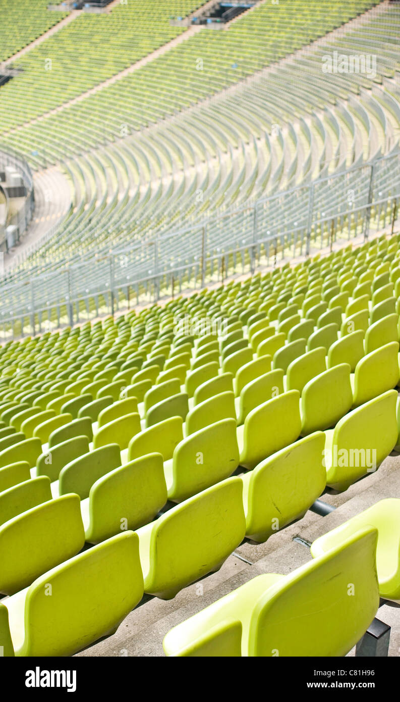 Empty plastic seats at stadium, open door sports arena Stock Photo - Alamy