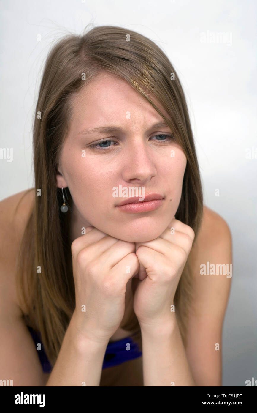 Girl with upset expression Stock Photo - Alamy