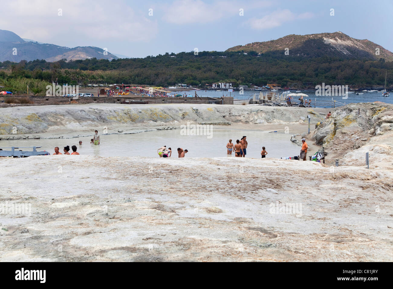 People in mud pond for beauty treatment, island of Vulcano, active ...