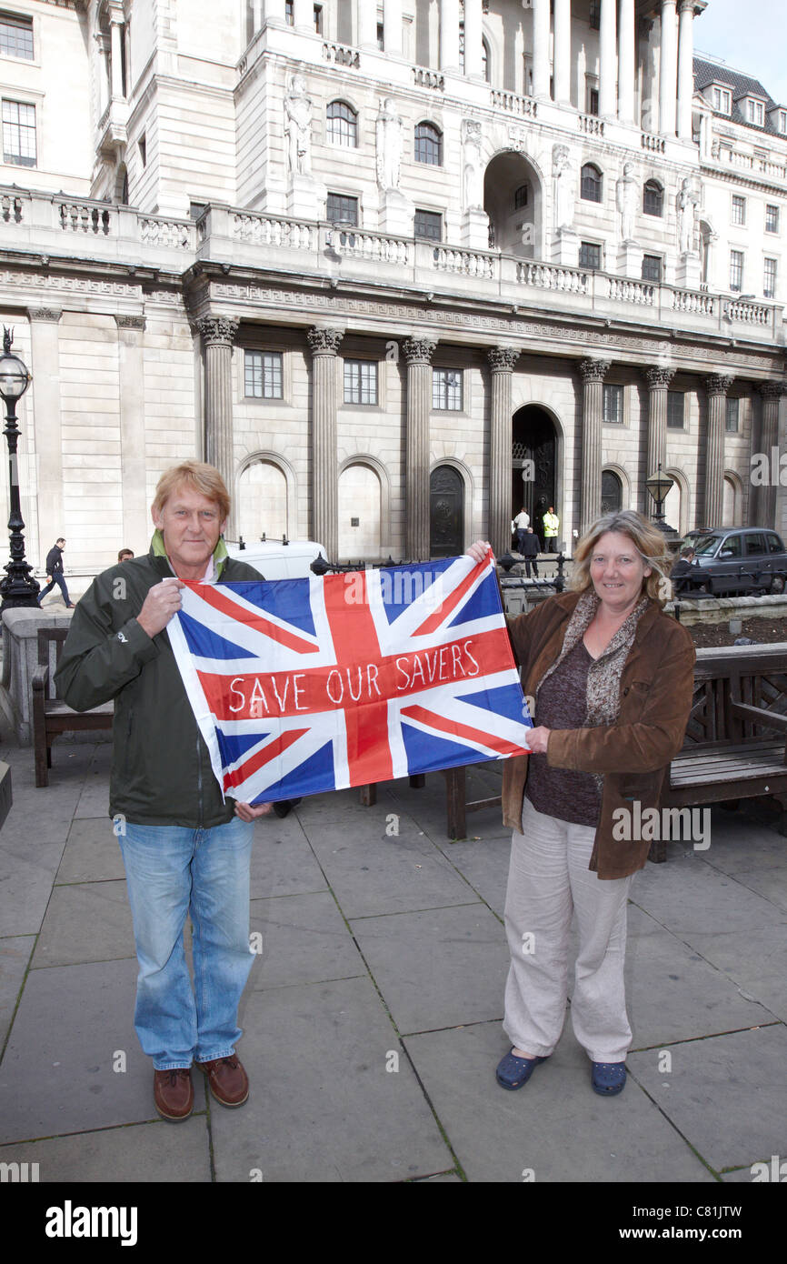 Campaigners from Save Our Savers protest outside the Bank of England ...