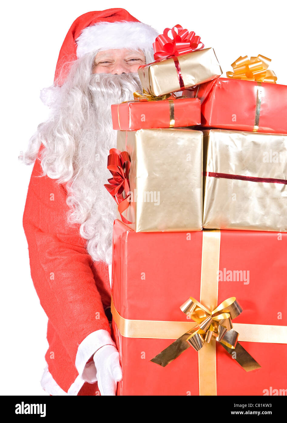 Santa Claus carries a pile of gifts on white background Stock Photo - Alamy