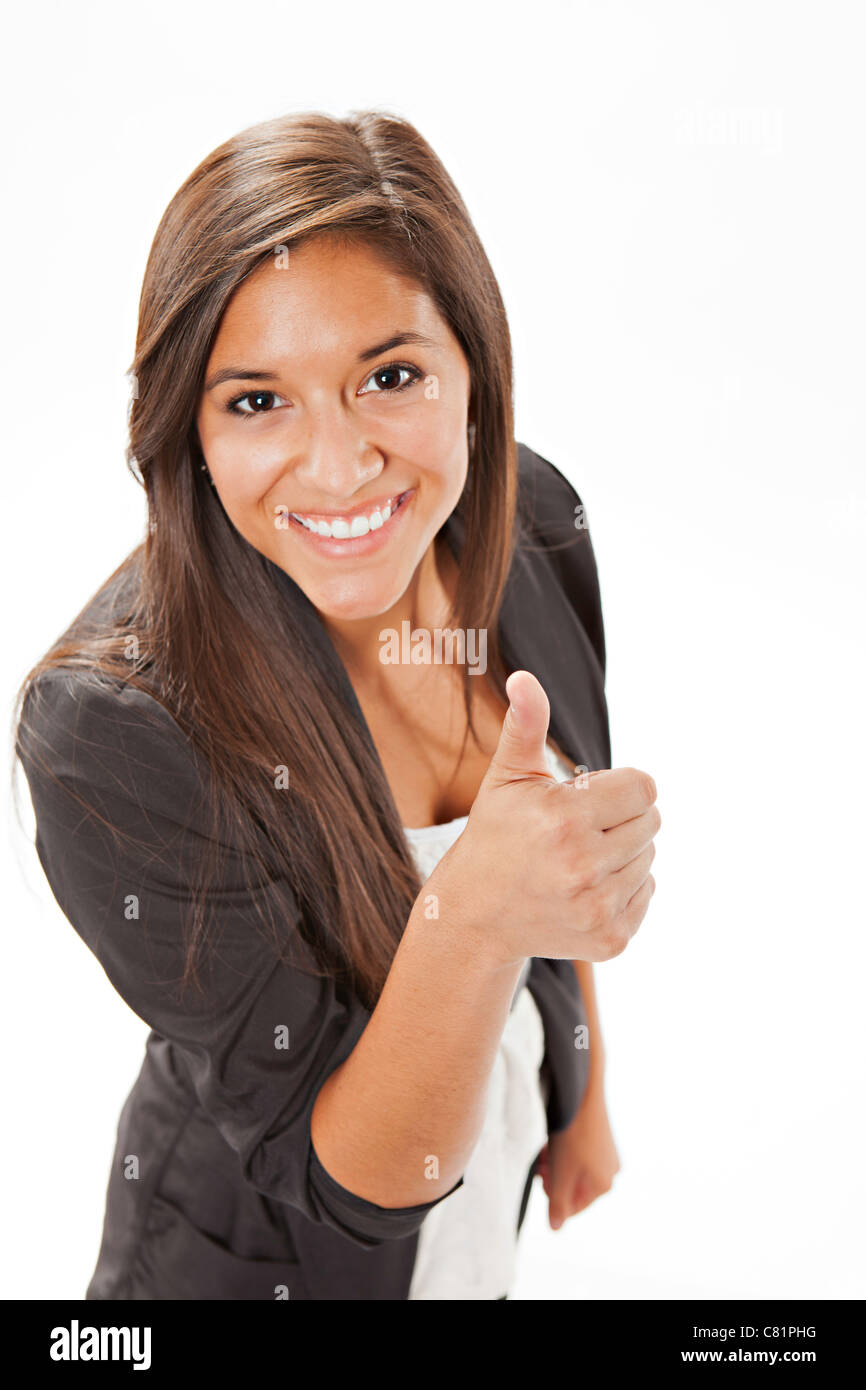 An cute attractive smiling teenage female girl giving the thumbs up ...
