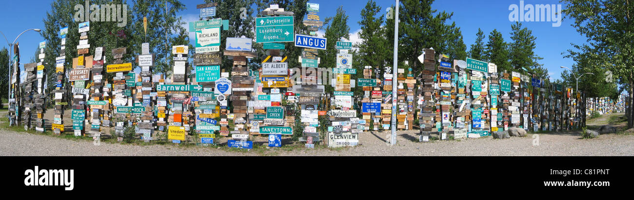 panoramic image of the Watson Lake road sign forest along the Alaskan ...