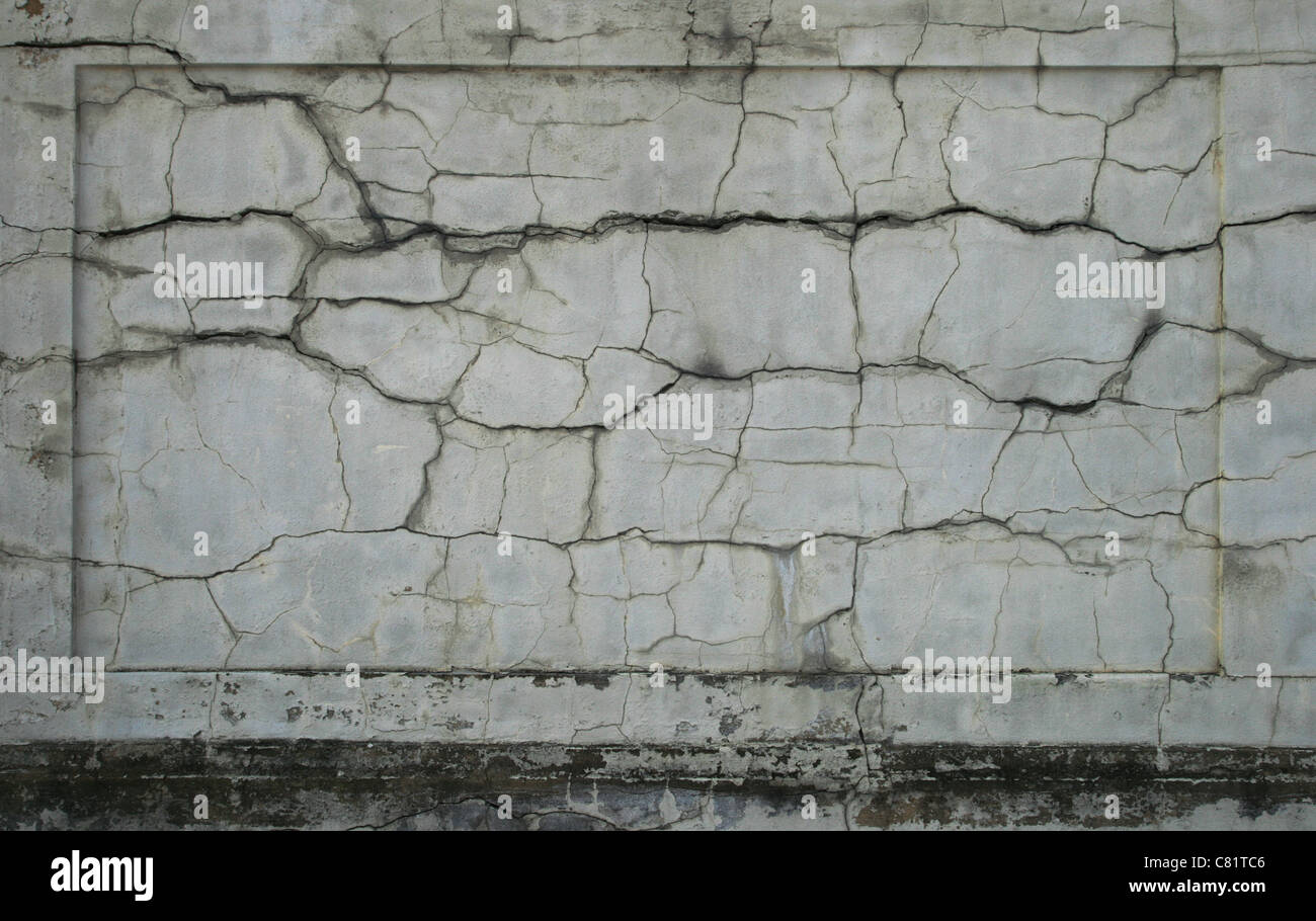 damaged plastered cracked wall panel for background texture Stock Photo ...