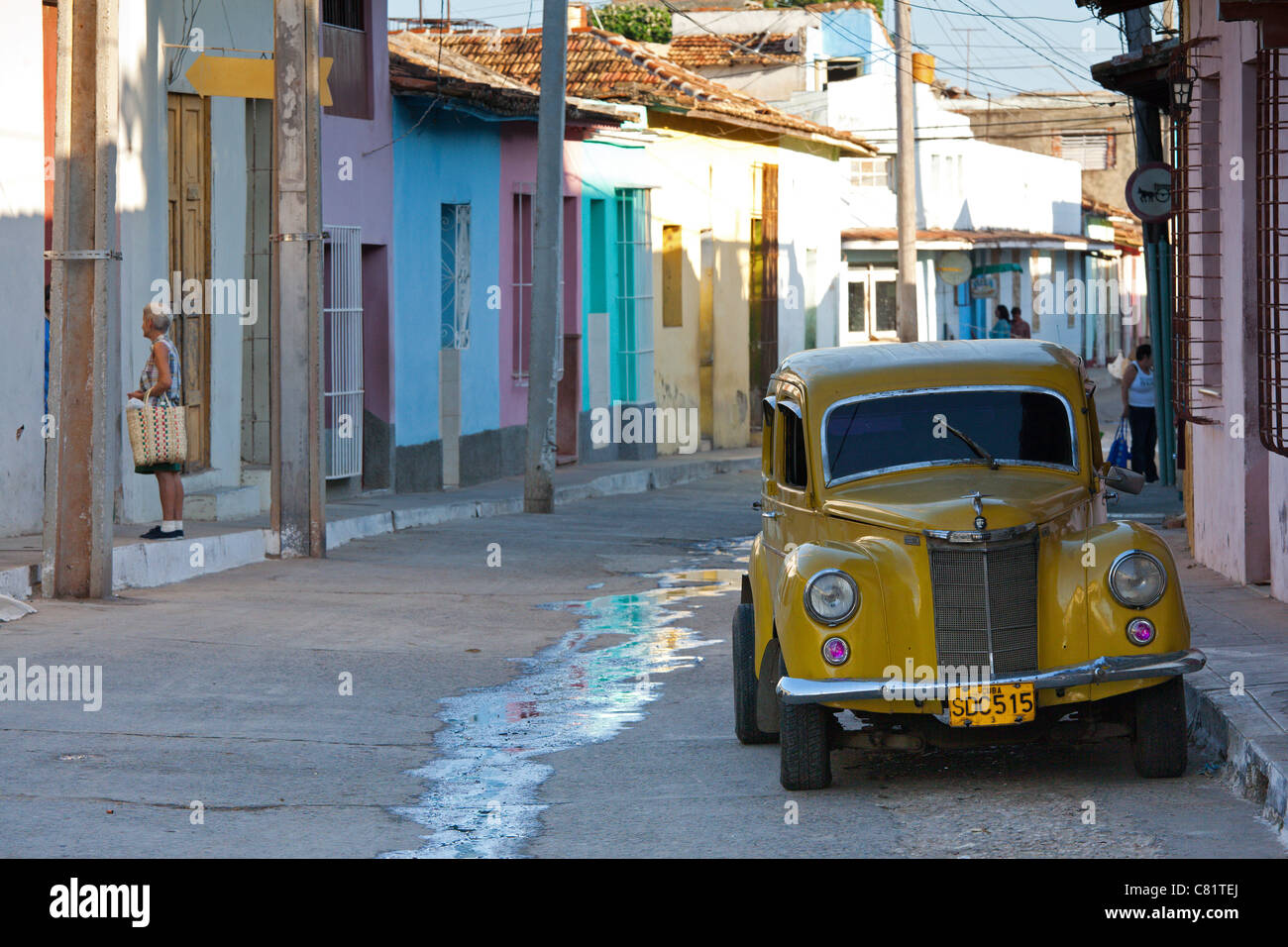 TRINIDAD: STREET SCENE WITH OLD CAR Stock Photo - Alamy