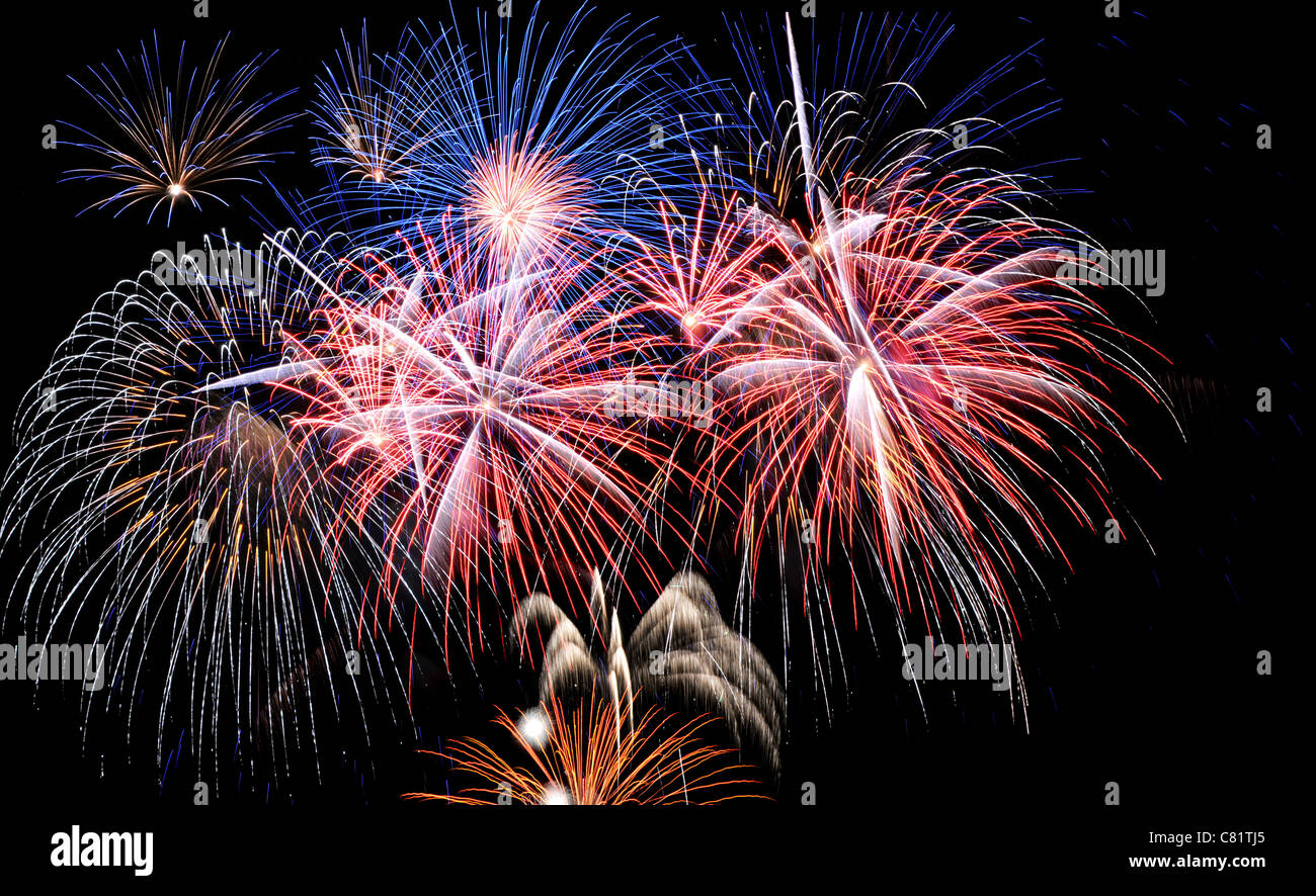 Fireworks of multiple colors bursting against a black background Stock ...