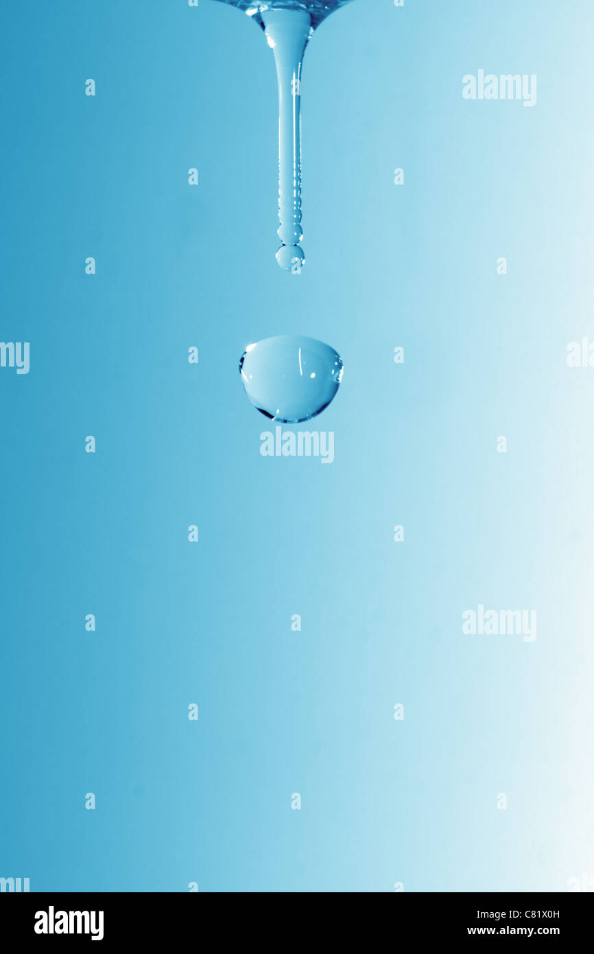 Drop of water frozen in free fall Stock Photo - Alamy