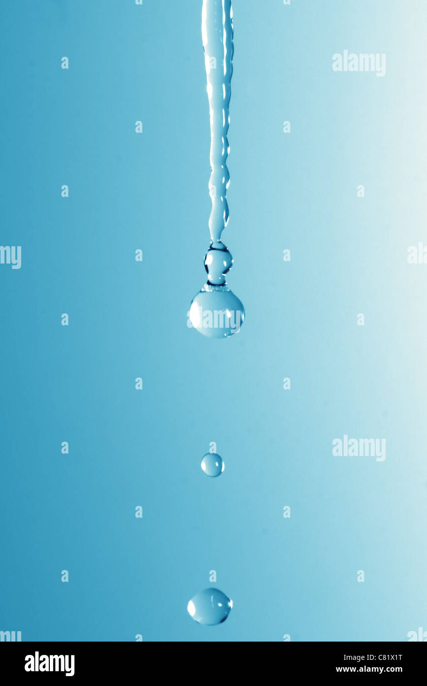 Drop of water frozen in free fall Stock Photo - Alamy