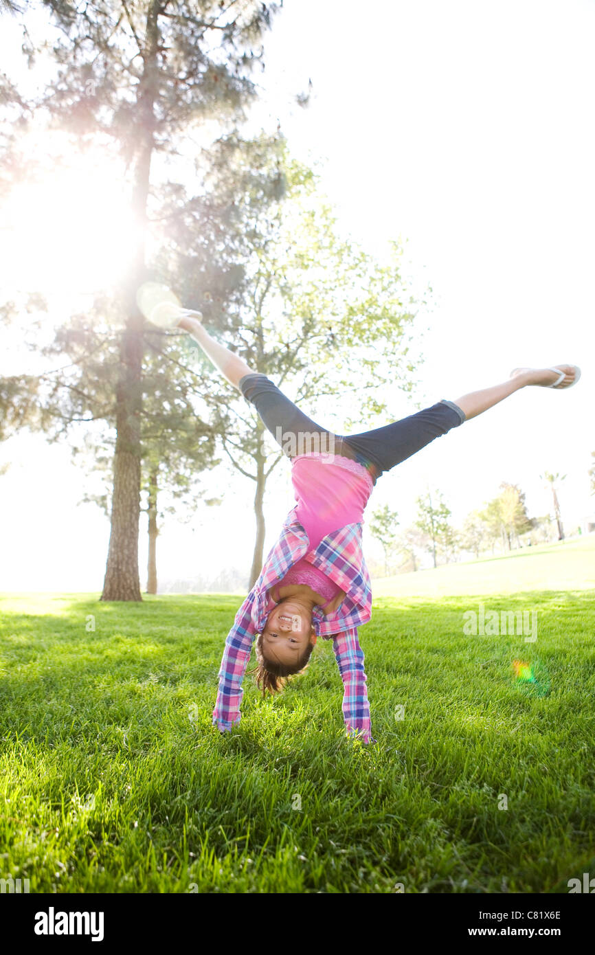 Girl doing cartwheel hi-res stock photography and images - Alamy
