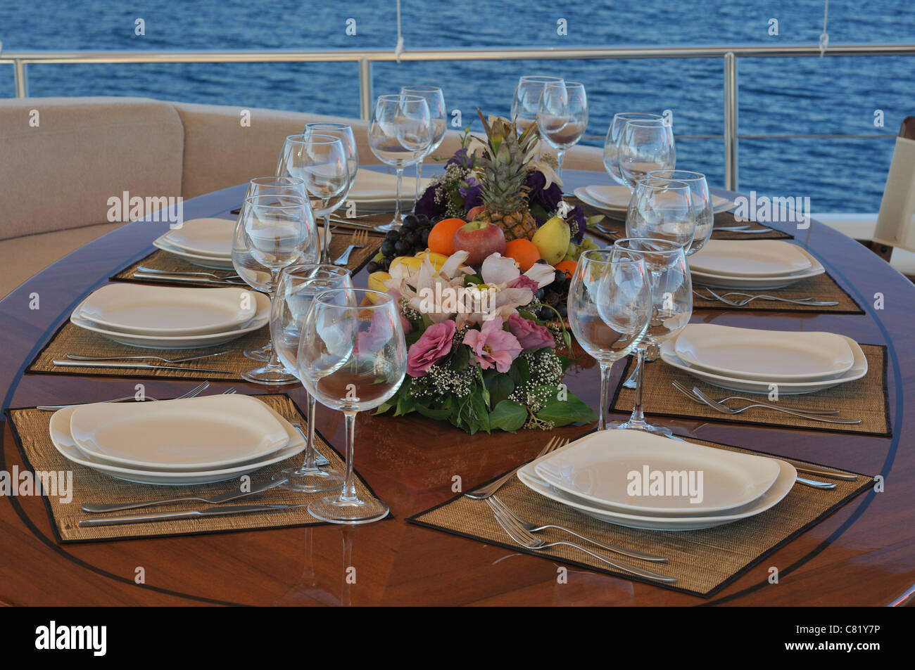 dinner table on the deck of luxury sailboat Stock Photo - Alamy