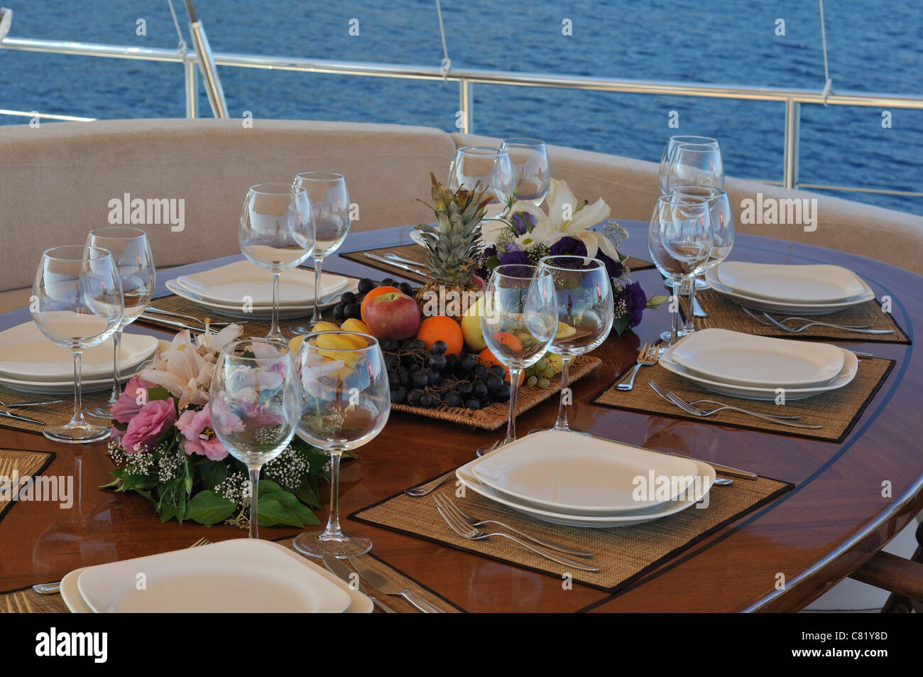 dinner table on the deck of luxury sailboat Stock Photo - Alamy