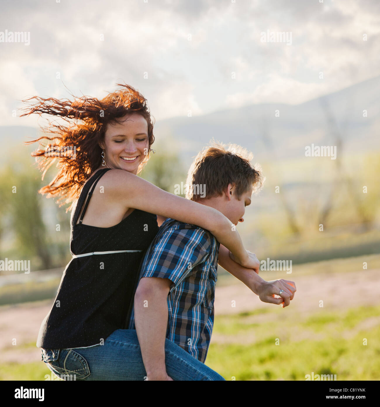 Piggyback ride 16 17 years hi-res stock photography and images - Alamy