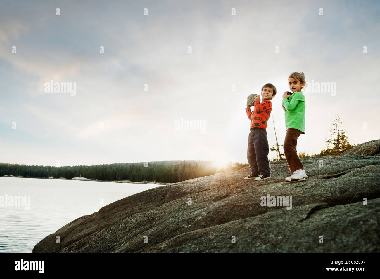 Children playing rocks hi-res stock photography and images - Alamy