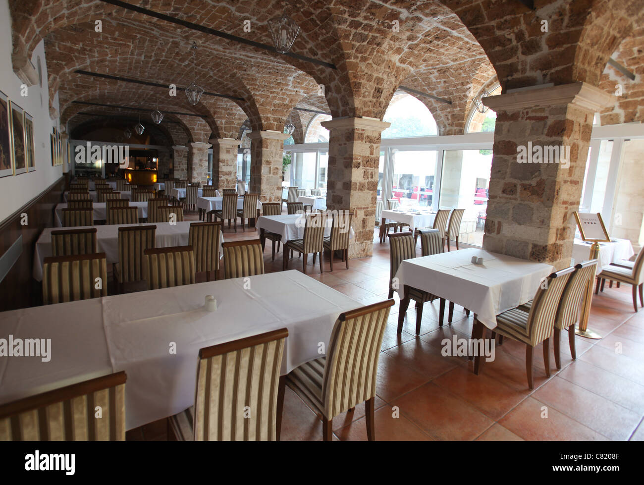 Restaurant interior with stone and red brick columns Stock Photo - Alamy
