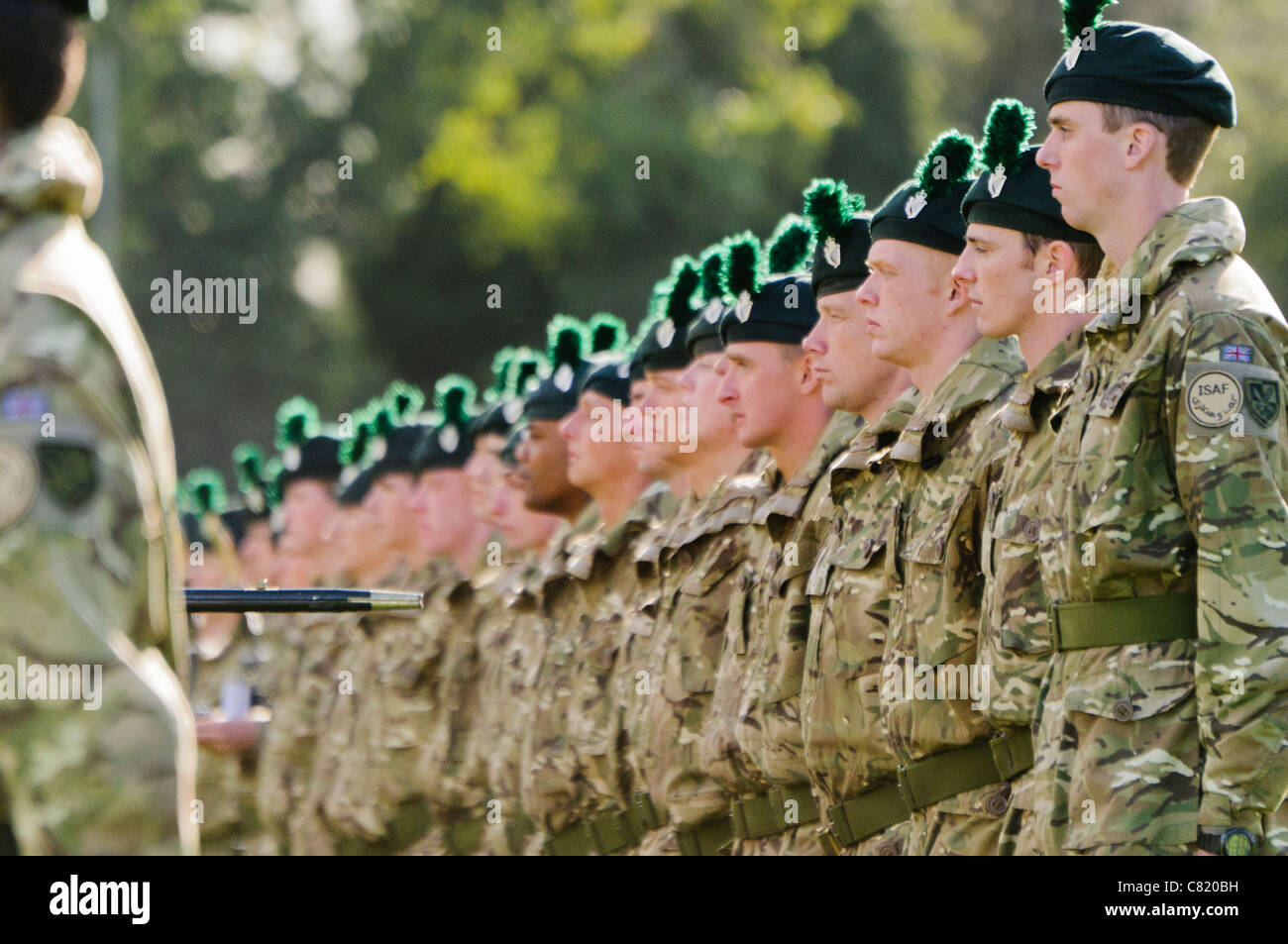 Soldiers from the Royal Irish Regiment and the Irish Guards on parade ...