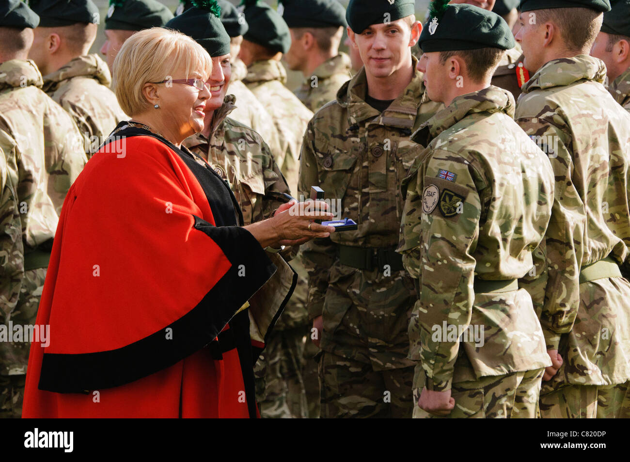 Soldiers from the Royal Irish Regiment and the Irish Guards receive ...