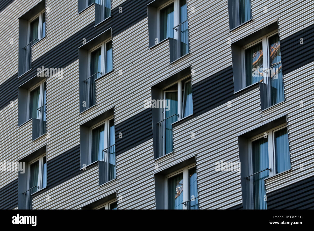 An architectural facade on a modern building in the outskirts in Vienna ...