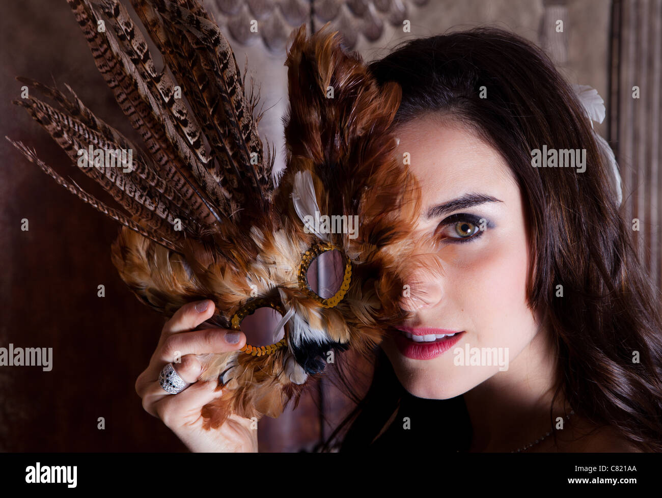 Feathered mask hi-res stock photography and images - Alamy