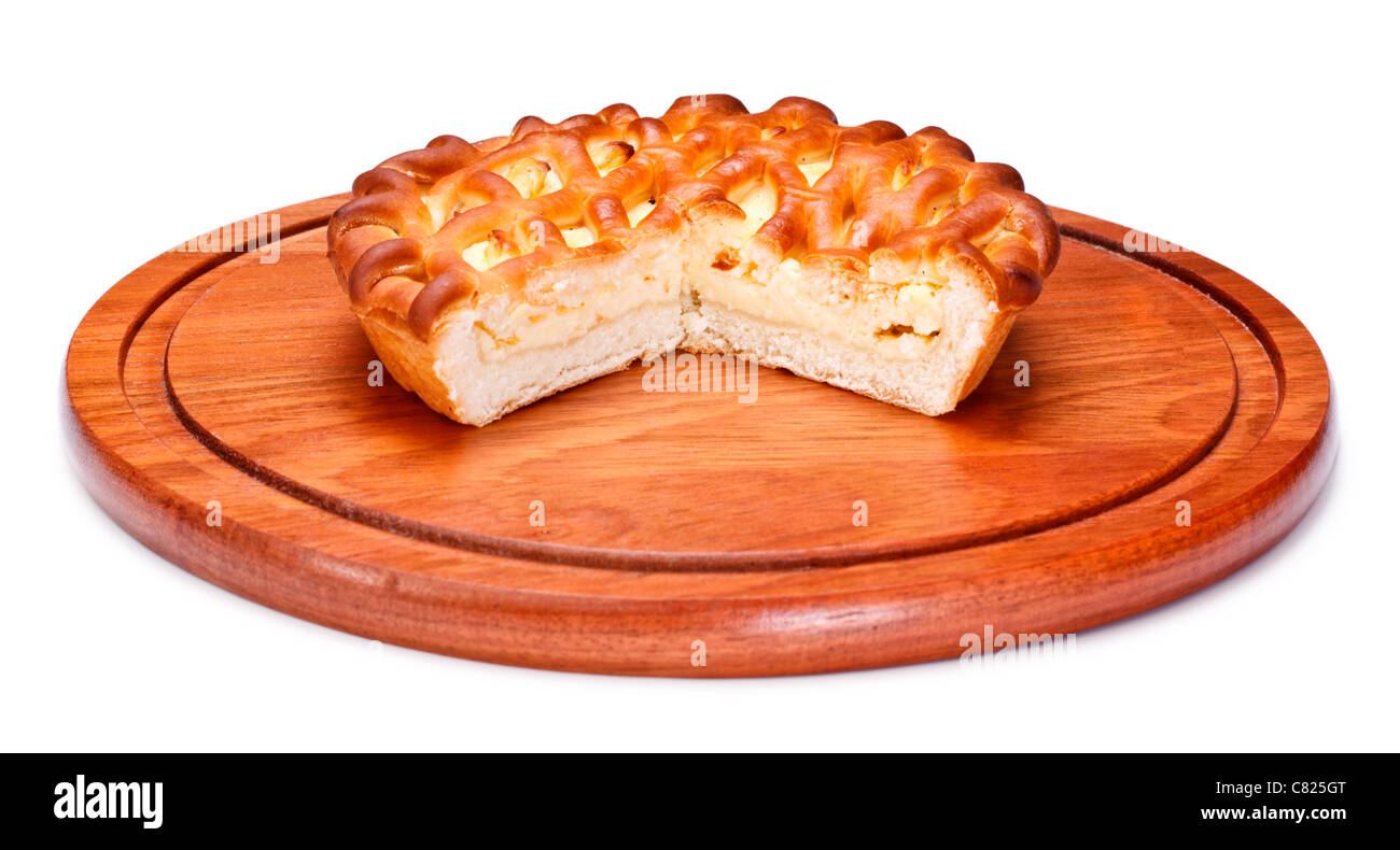 pie with curds on wooden tray, isolated on white Stock Photo - Alamy