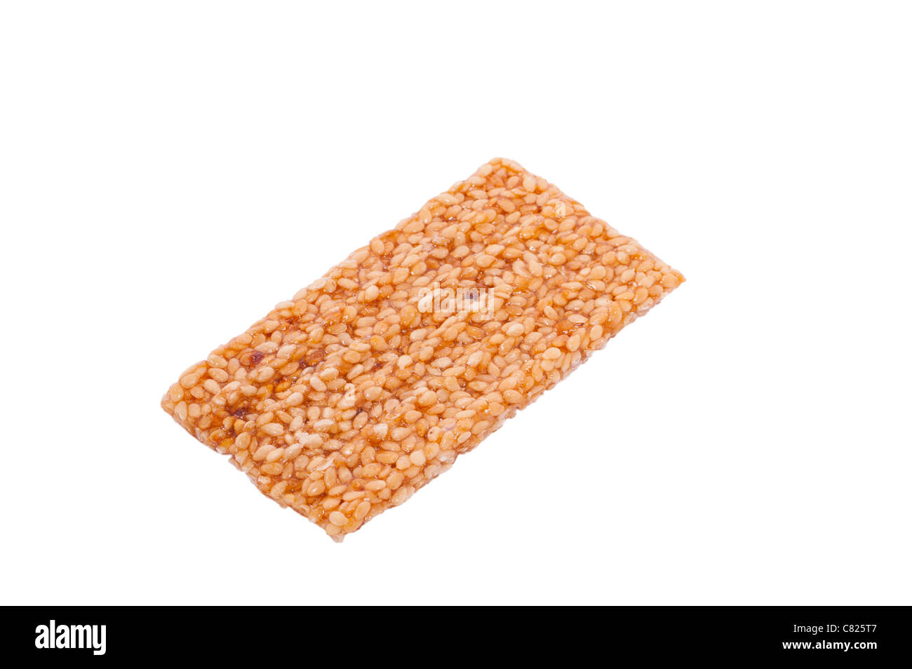 A Sesame Snaps sesame seed biscuit on a white background Stock Photo ...