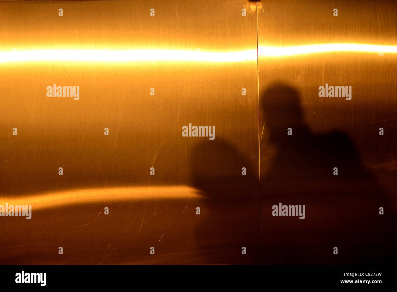 couples golden reflection Stock Photo - Alamy