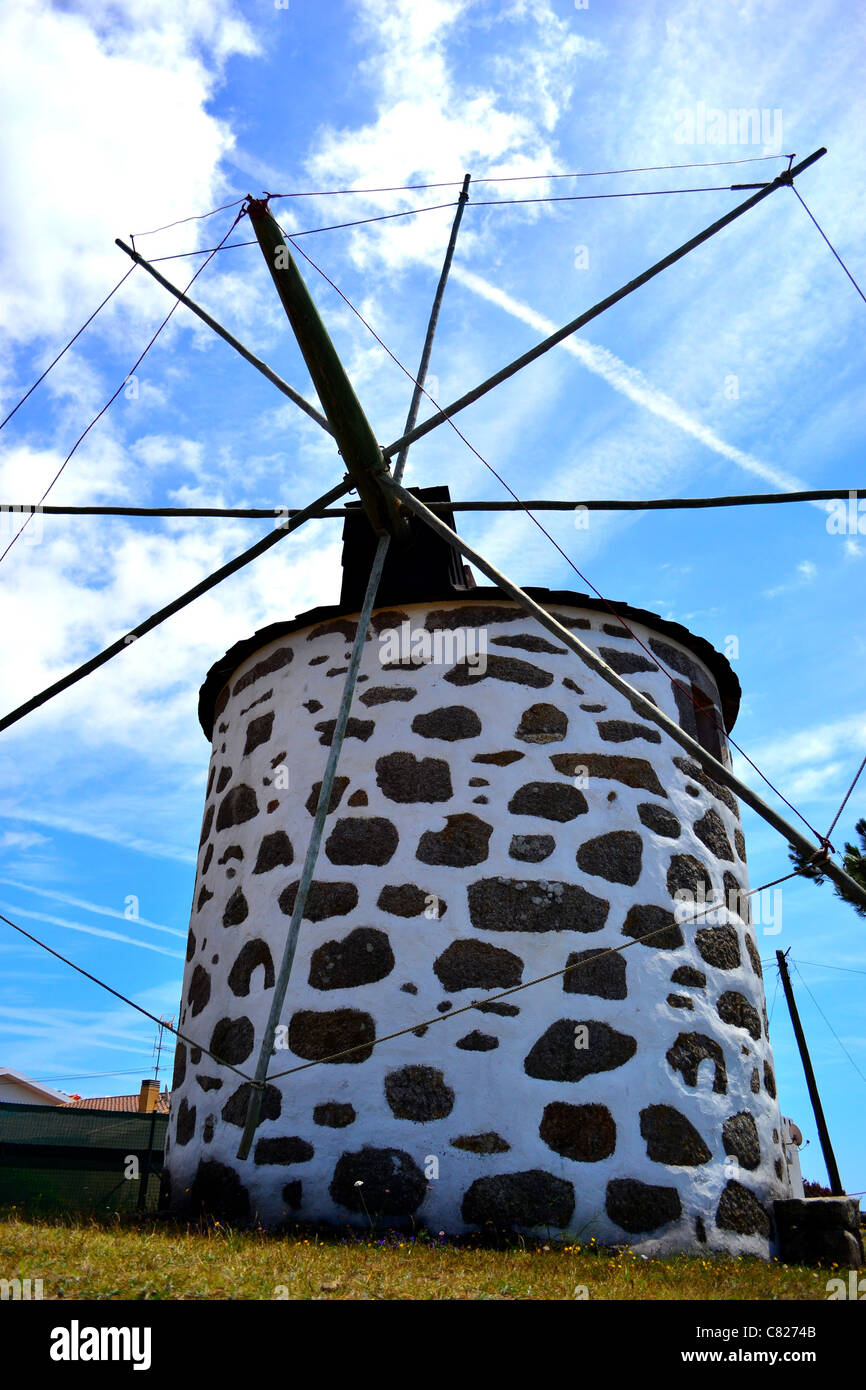 Old stone windmill under a beautiful blue sky Stock Photo - Alamy