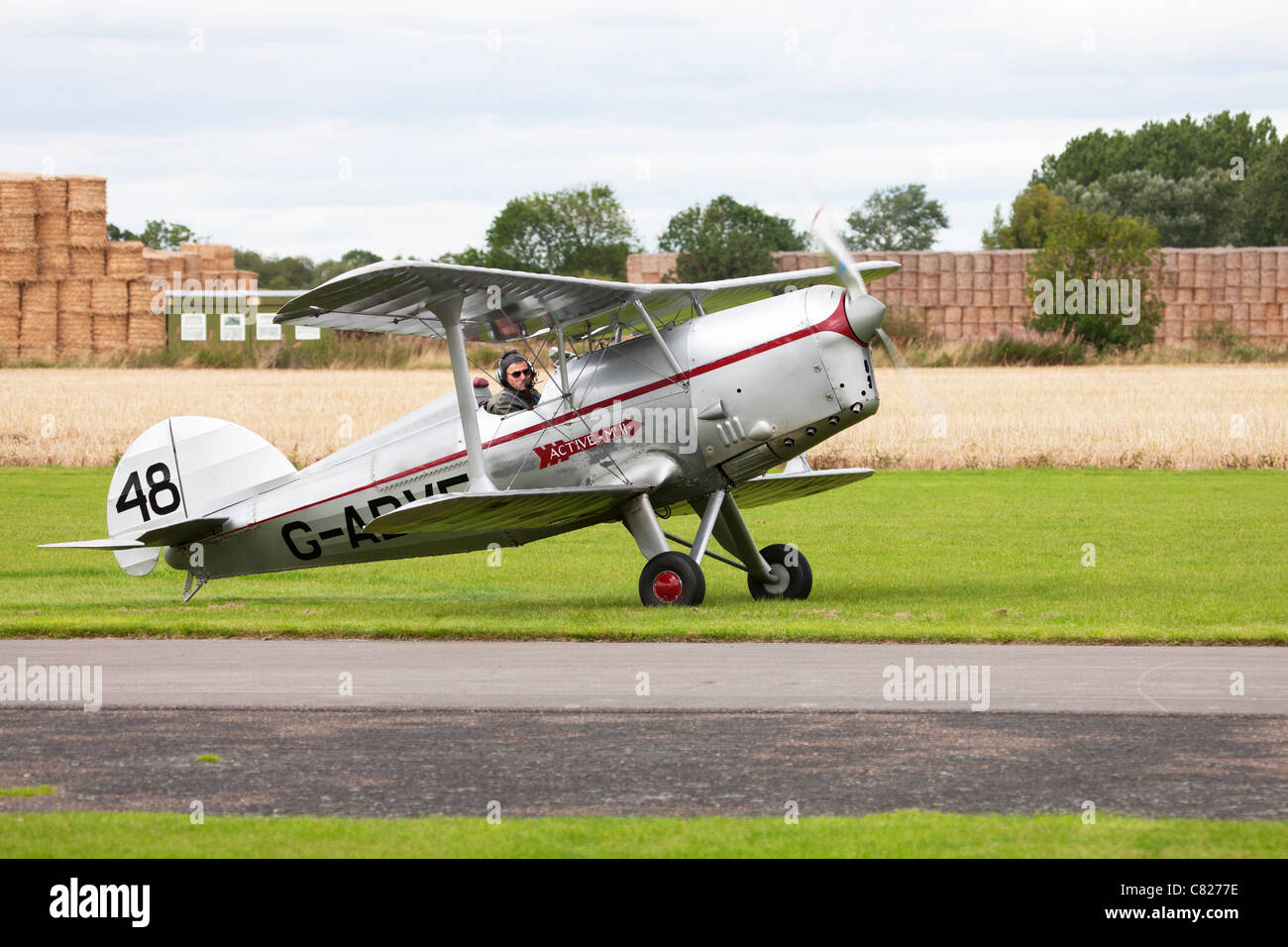 Arrow Active G-ABVE 48 taxiing along runway Stock Photo - Alamy