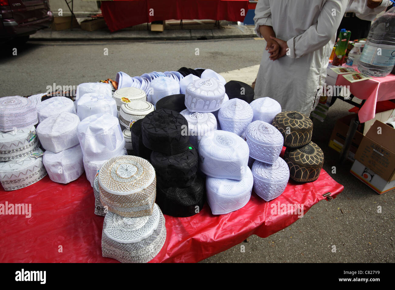 Man selling Kufi, the traditional muslim hats, Kuala Lumpur, Malaysia ...