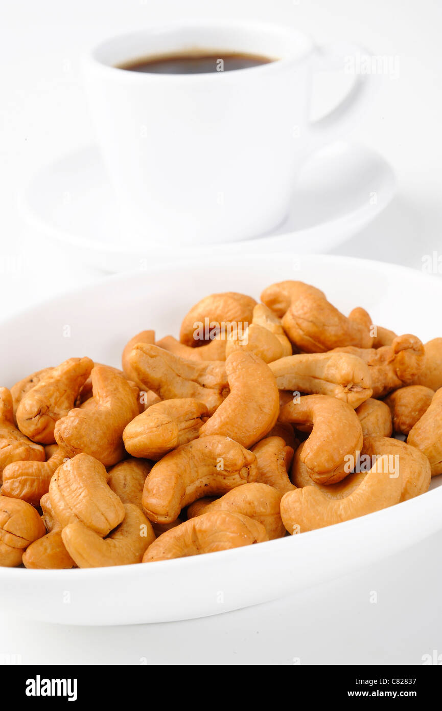 cashew nuts and coffee on white Stock Photo - Alamy