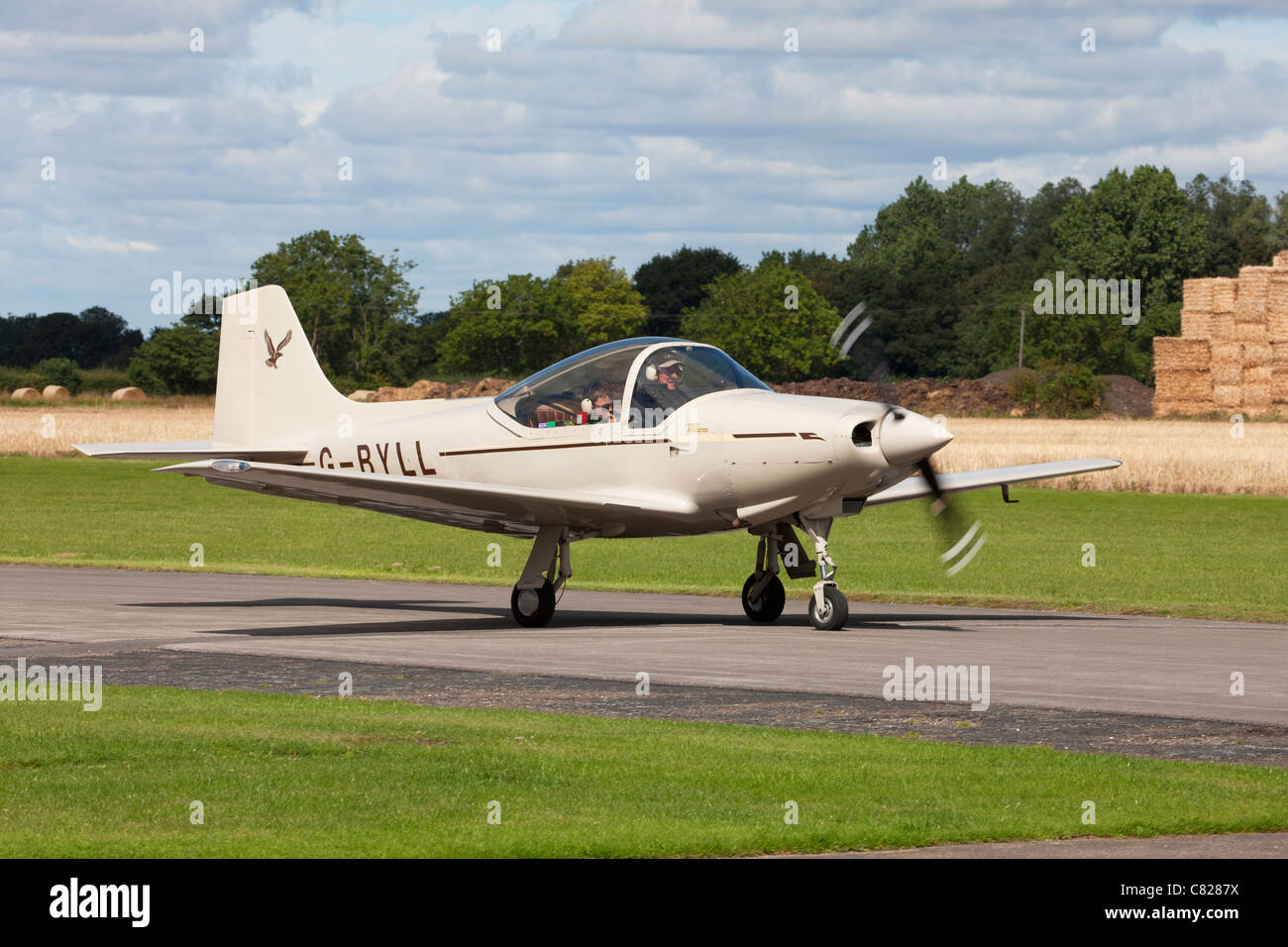Falco F8L G-BYLL taxiing along runway at Breighton Airfield Stock Photo ...