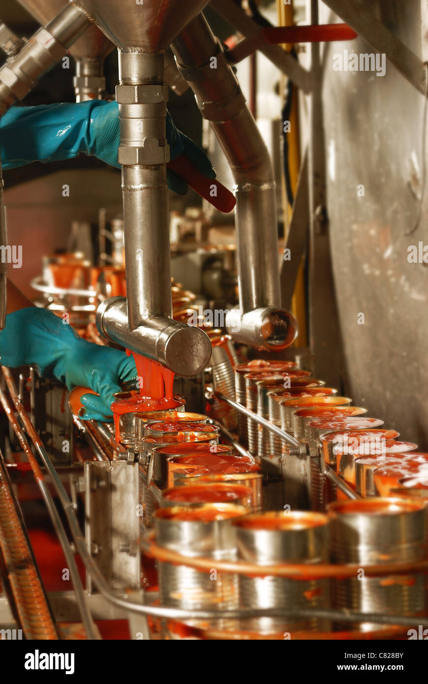 Can packing hi-res stock photography and images - Alamy