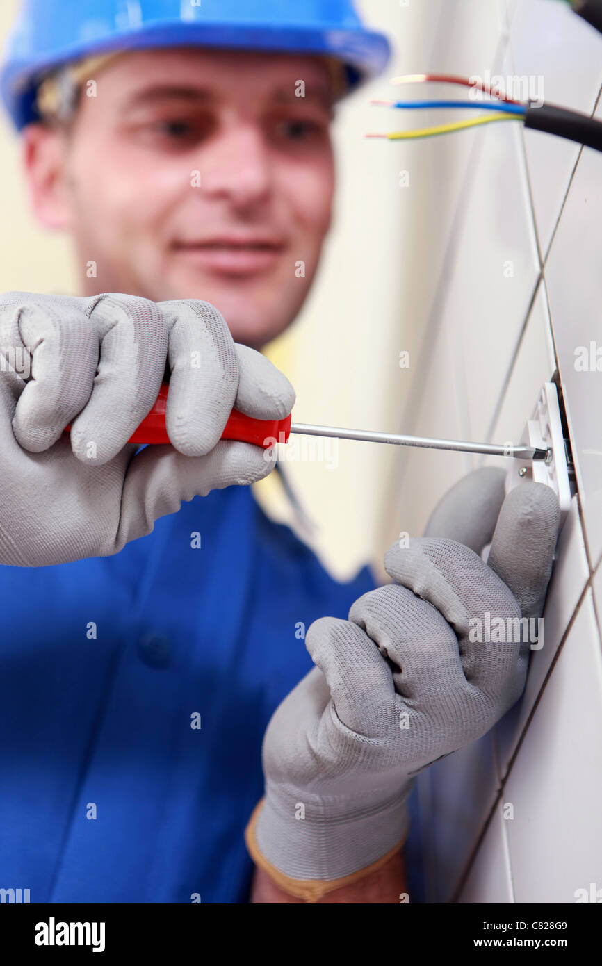 Closeup of an electrician at work Stock Photo - Alamy