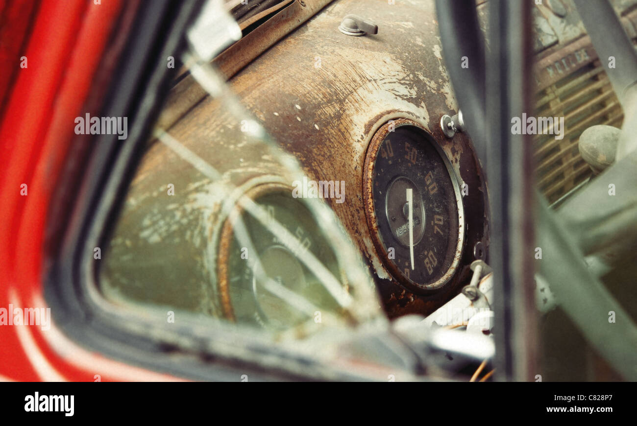 A speedometer as viewed through a broken window Stock Photo - Alamy