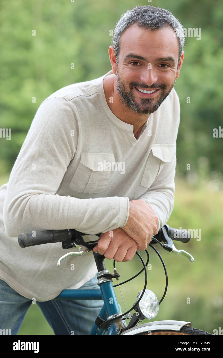 Man on bike ride Stock Photo - Alamy