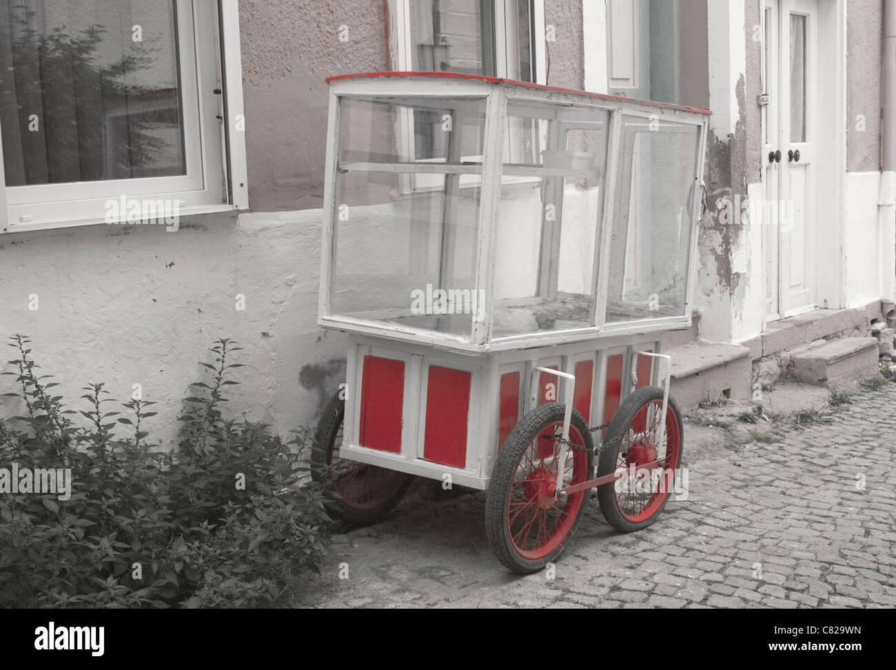 Old food cart sitting on pedestrian street, Ayvalik, Turkey Stock Photo ...