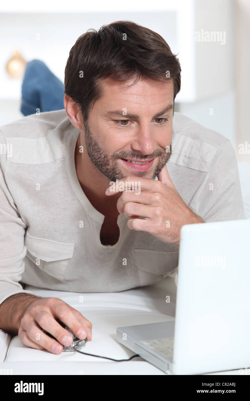 Man on laptop Stock Photo - Alamy