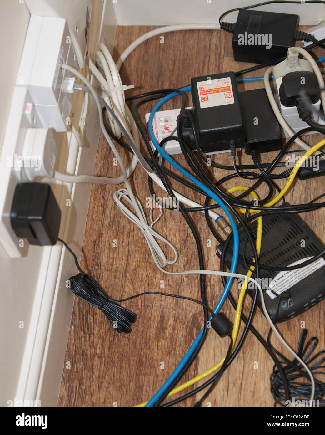 Health and safety hazard of spaghetti electrics Stock Photo - Alamy